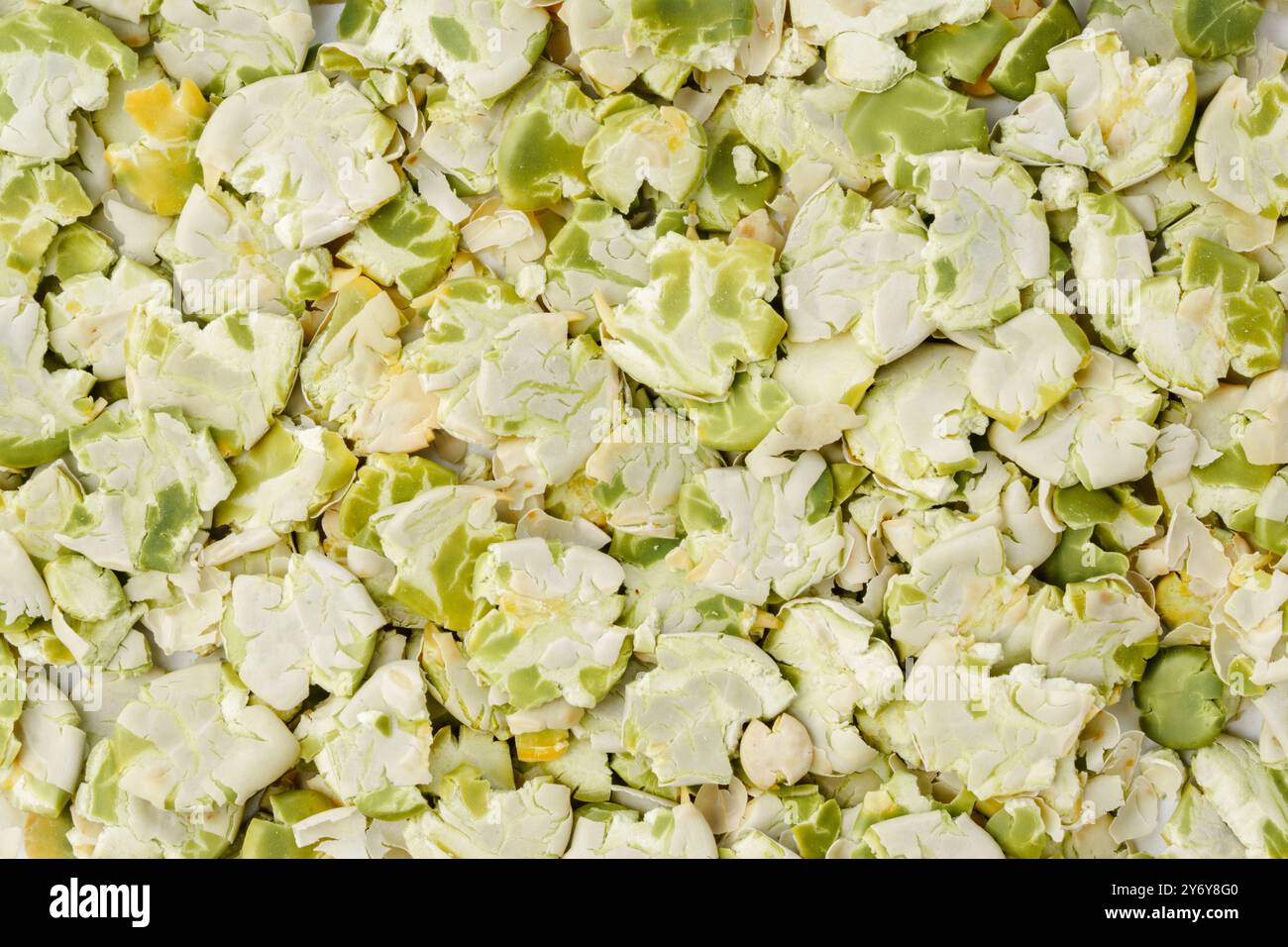 Nutritious green pea flakes scattered for background Stock Photo - Alamy