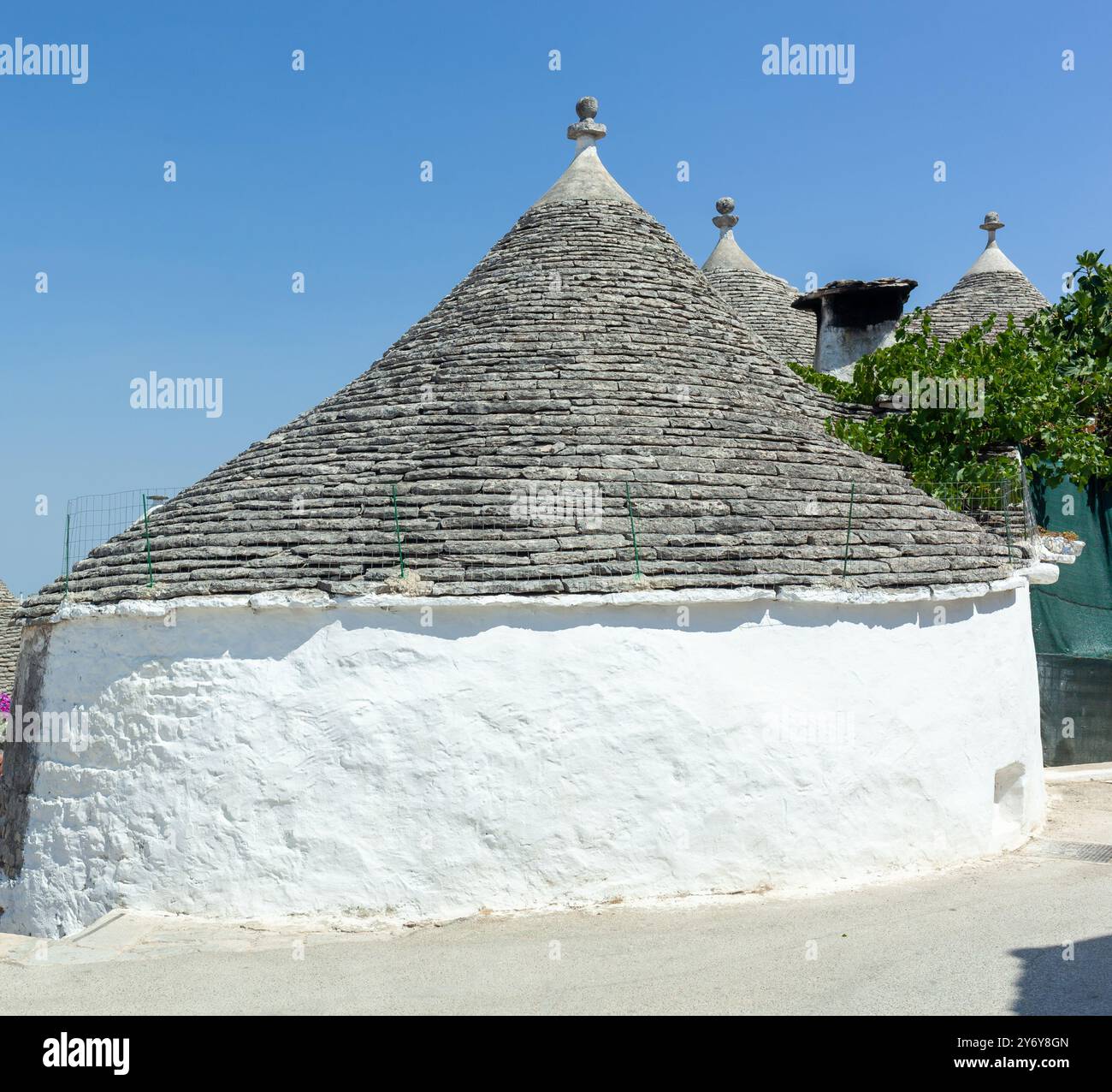 Ancient trulli houses in alberobello, puglia, are characterized by ...