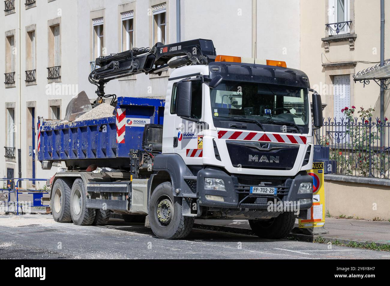 Nancy, France - View on a white and blue dump truck MAN TGS 33.460 with ...