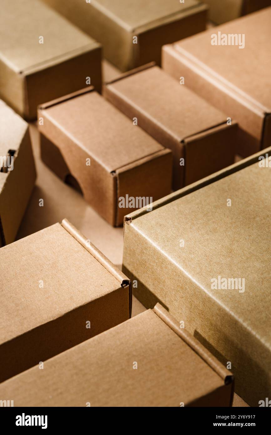 Multiple cardboard boxes arranged on a surface for packaging and ...