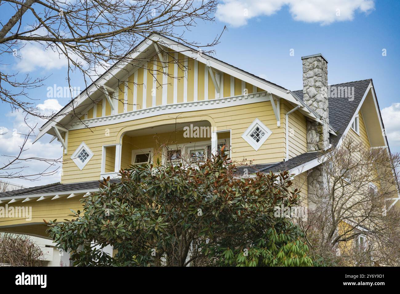 Old farm house with blue sky in the back ground. Old house exterior ...