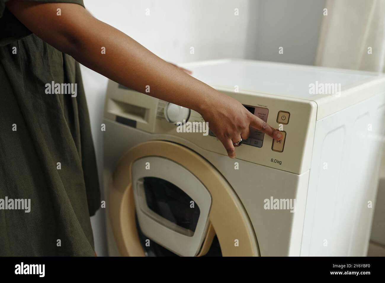 Operating Washing Machine with Touch Panel Interface Stock Photo - Alamy