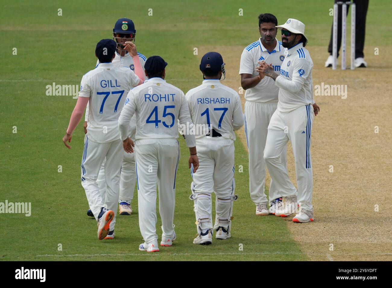 India's Ravichandran Ashwin, second right, celebrates with teammates ...