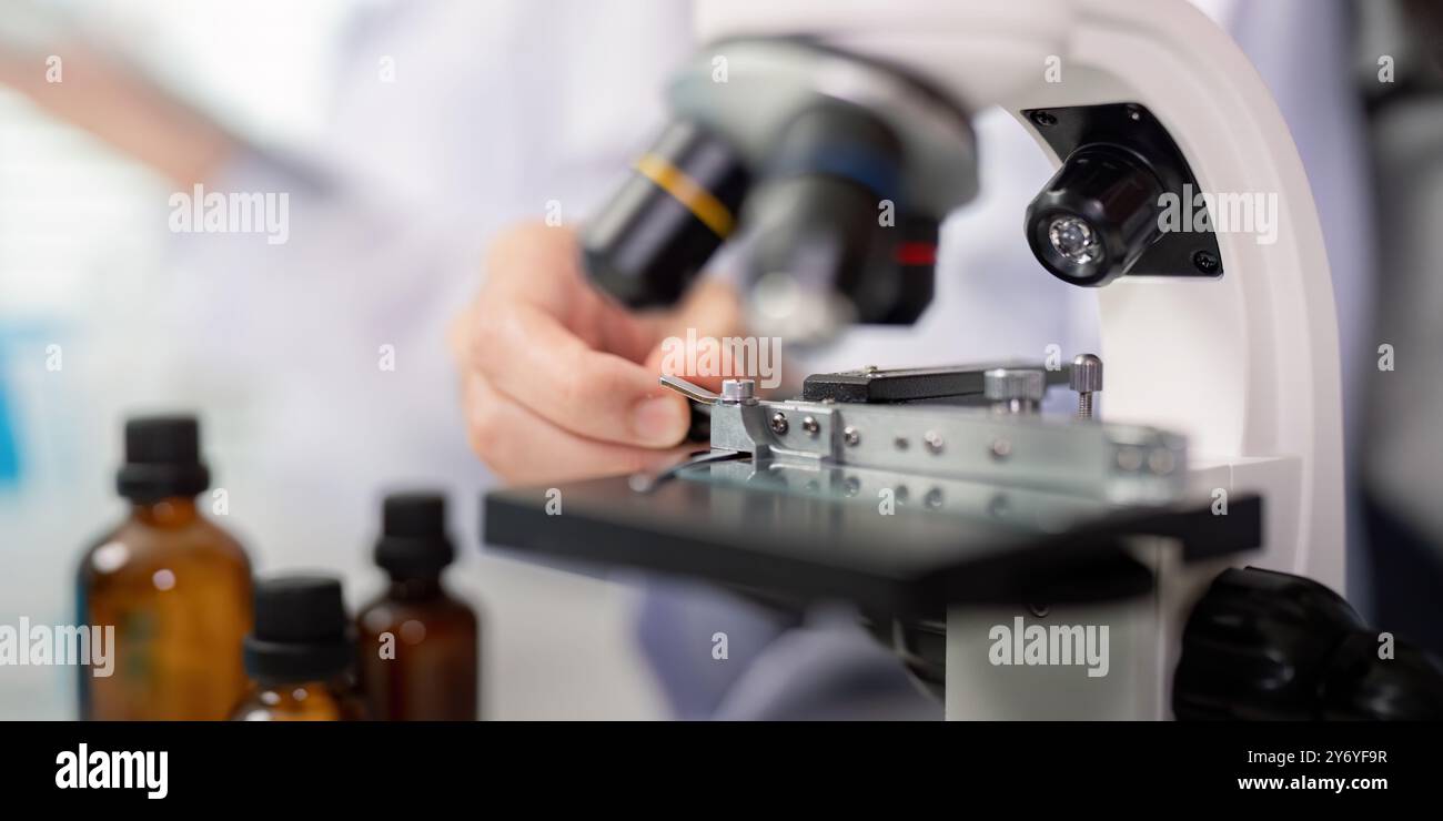 Close up on Scientist Conducting Precision Analysis with Laboratory ...