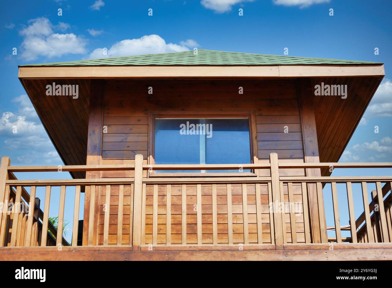 Wooden house with one window exterior facade view Stock Photo - Alamy