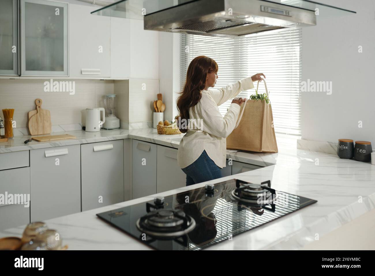 Kitchen interior design woman hi-res stock photography and images - Alamy