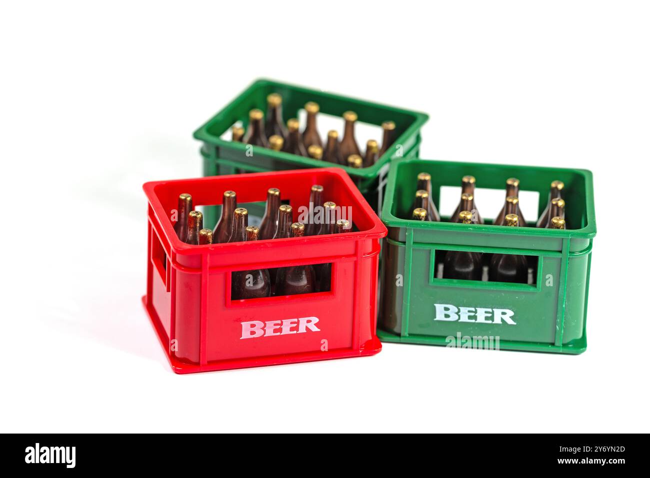 Three beer crates in front of a white background Stock Photo - Alamy