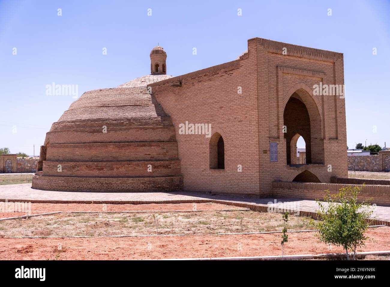 A large building with a dome on top and a small archway Stock Photo - Alamy
