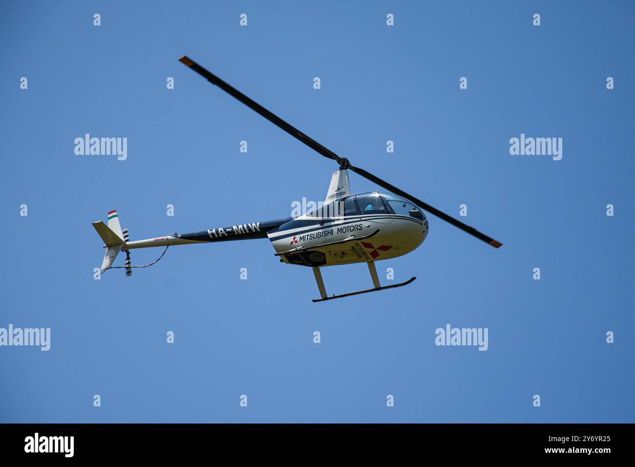 Robinson R 44 helicopter in the air at Szolnok air show, Hungary Stock ...
