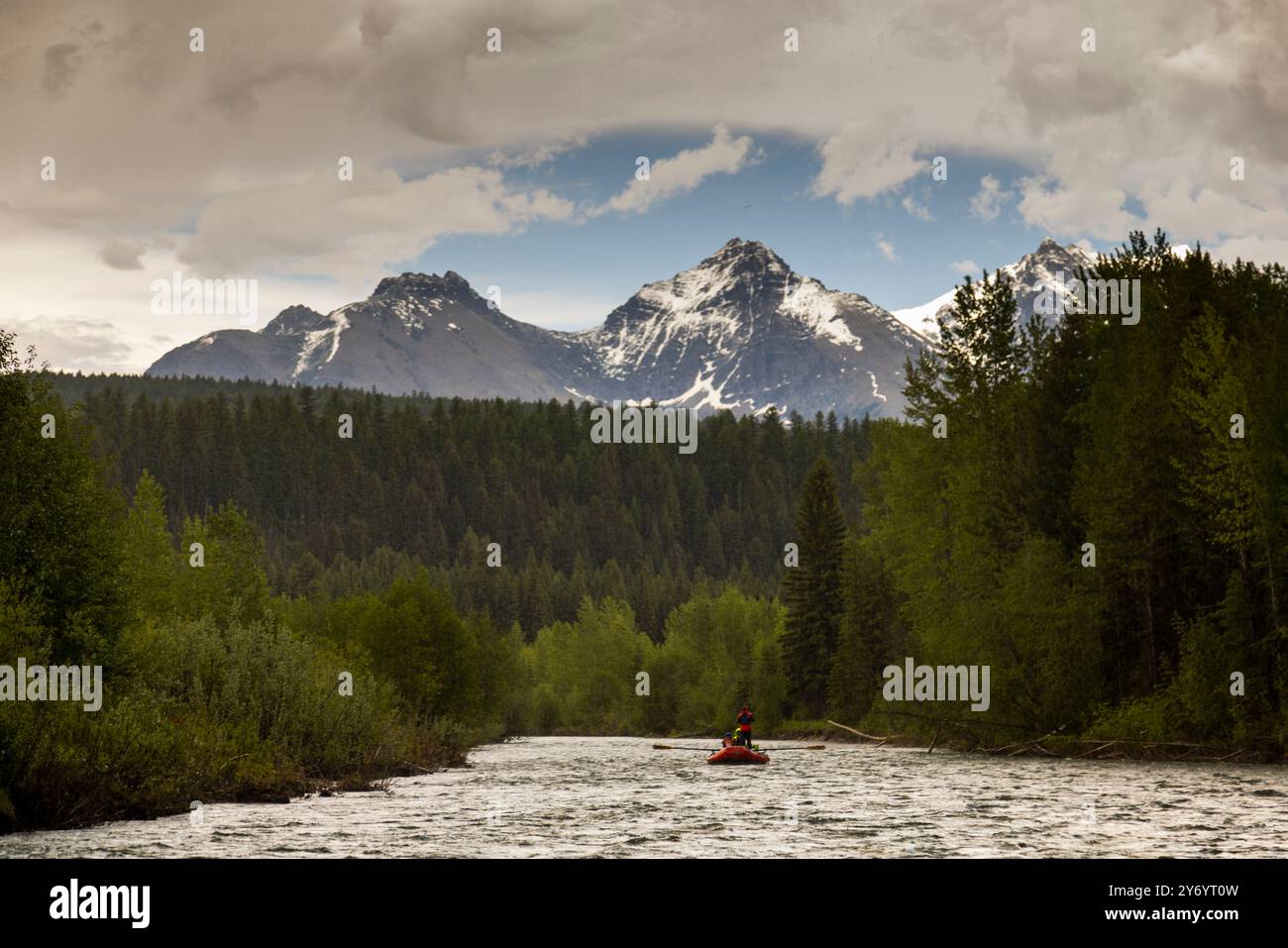 A raft floats down the North Fork of the Flathead River in Montana ...