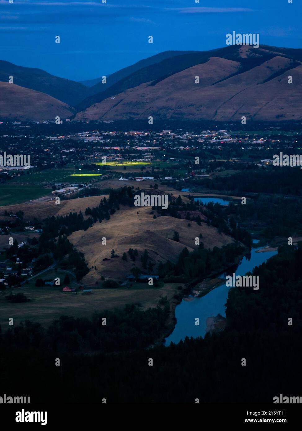 Missoula and the Bitterroot river at dusk Stock Photo - Alamy