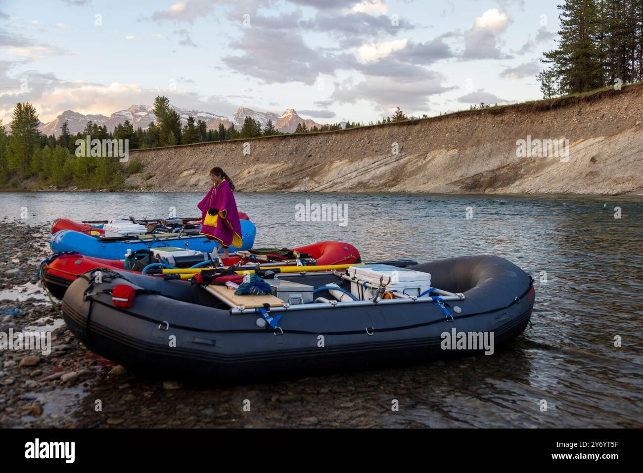 A young girl walks on rafts at a campsite in Montana Stock Photo - Alamy