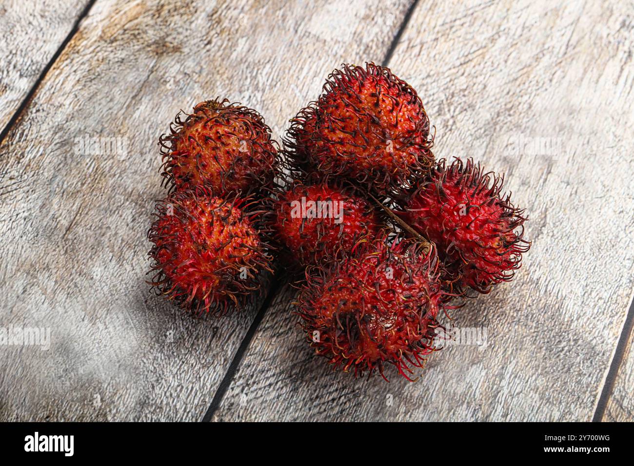 Sweet ripe juicy hairy Rambutan fruit Stock Photo - Alamy