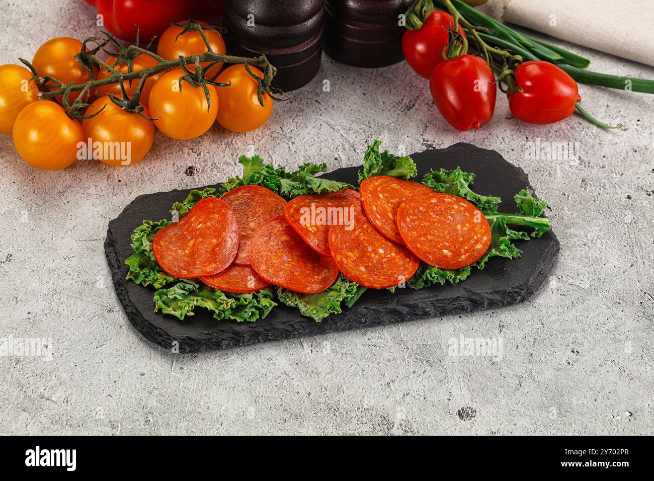 Spanish salami cured chorizo sausage slices Stock Photo - Alamy