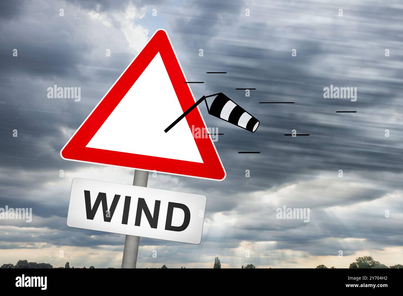 Comical Wind Warning Sign Gets Blown Away by a Storm Stock Photo - Alamy