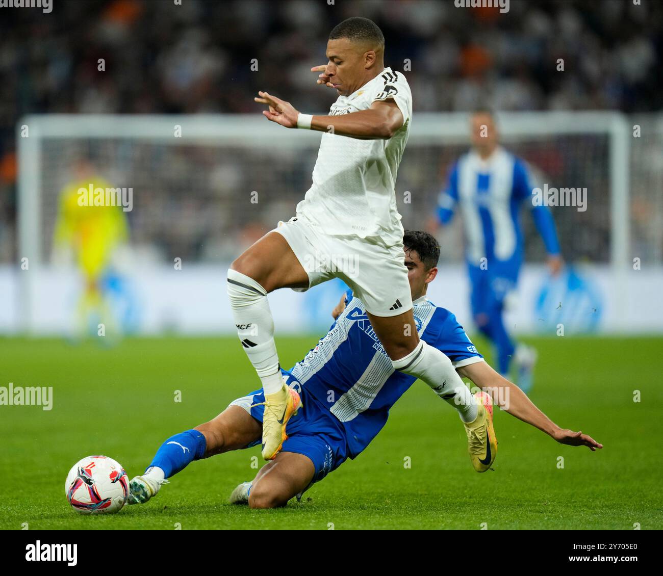 Kylian Mbappe of Real Madrid CF and Hugo Novoa of Deportivo Alaves during the La Liga EA Sports ...