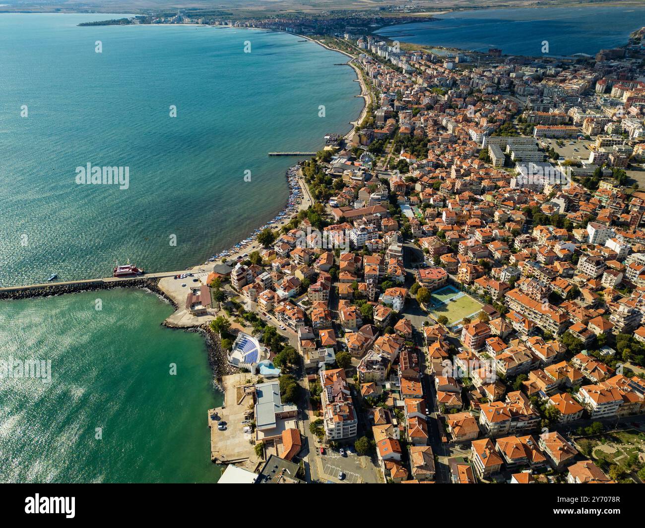 This coastal town features colorful rooftops, modern buildings, and a ...