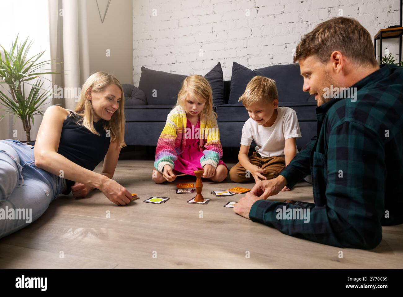 happy family with children enjoying time together at home, playing ...