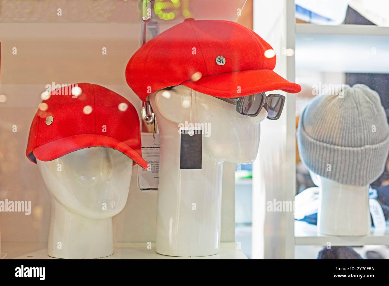 Elegant red caps hi-res stock photography and images - Alamy