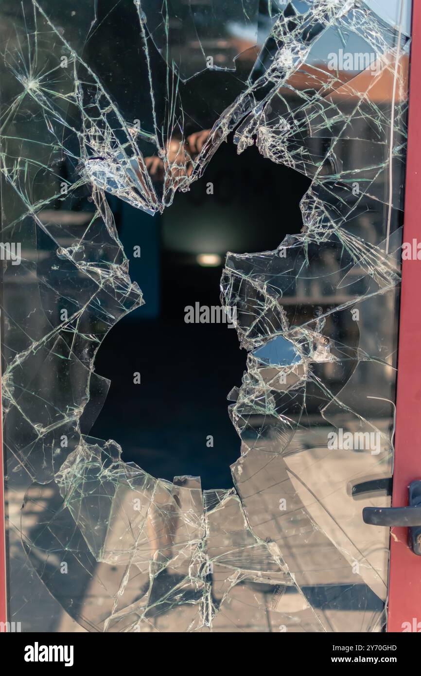 Broken glass door hi-res stock photography and images - Alamy