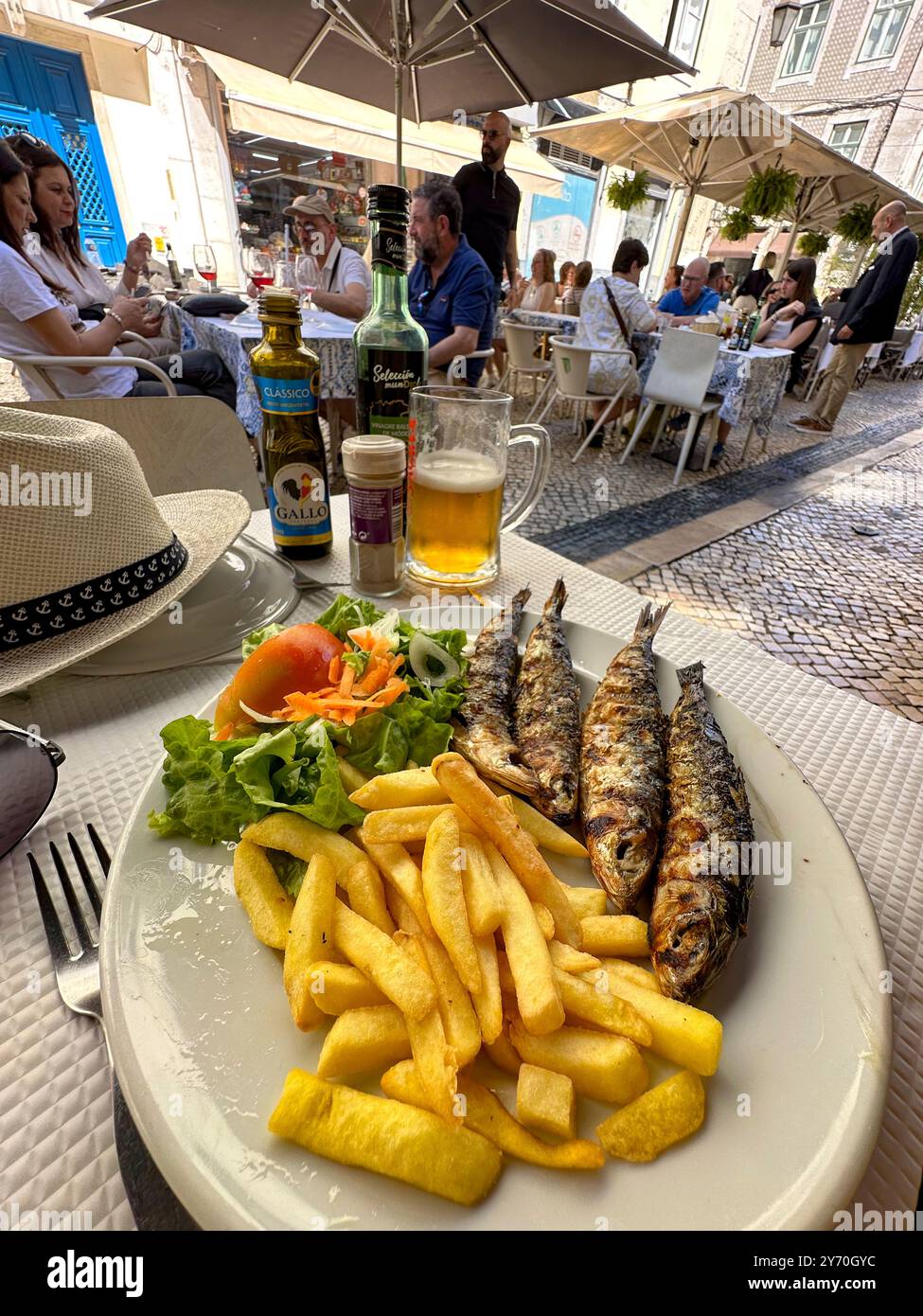 Lisbon street food, Sardines and chips, Portugal Stock Photo - Alamy