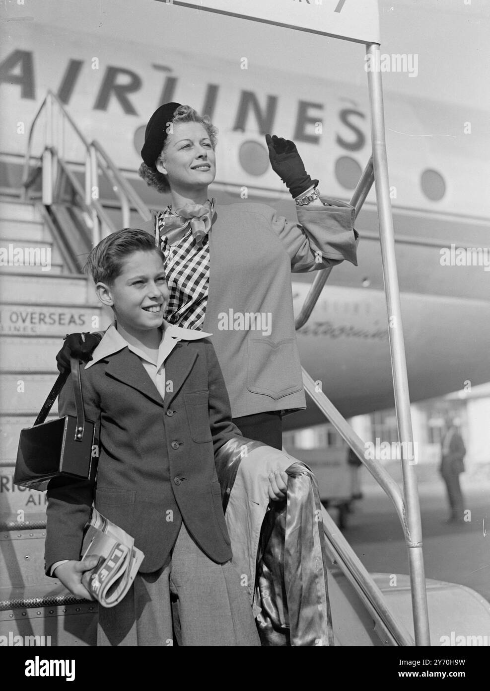 MOTHER AND SON FLIGHT Mrs . ALLAN JONES ( Irene Hervey |) , wife of the ...