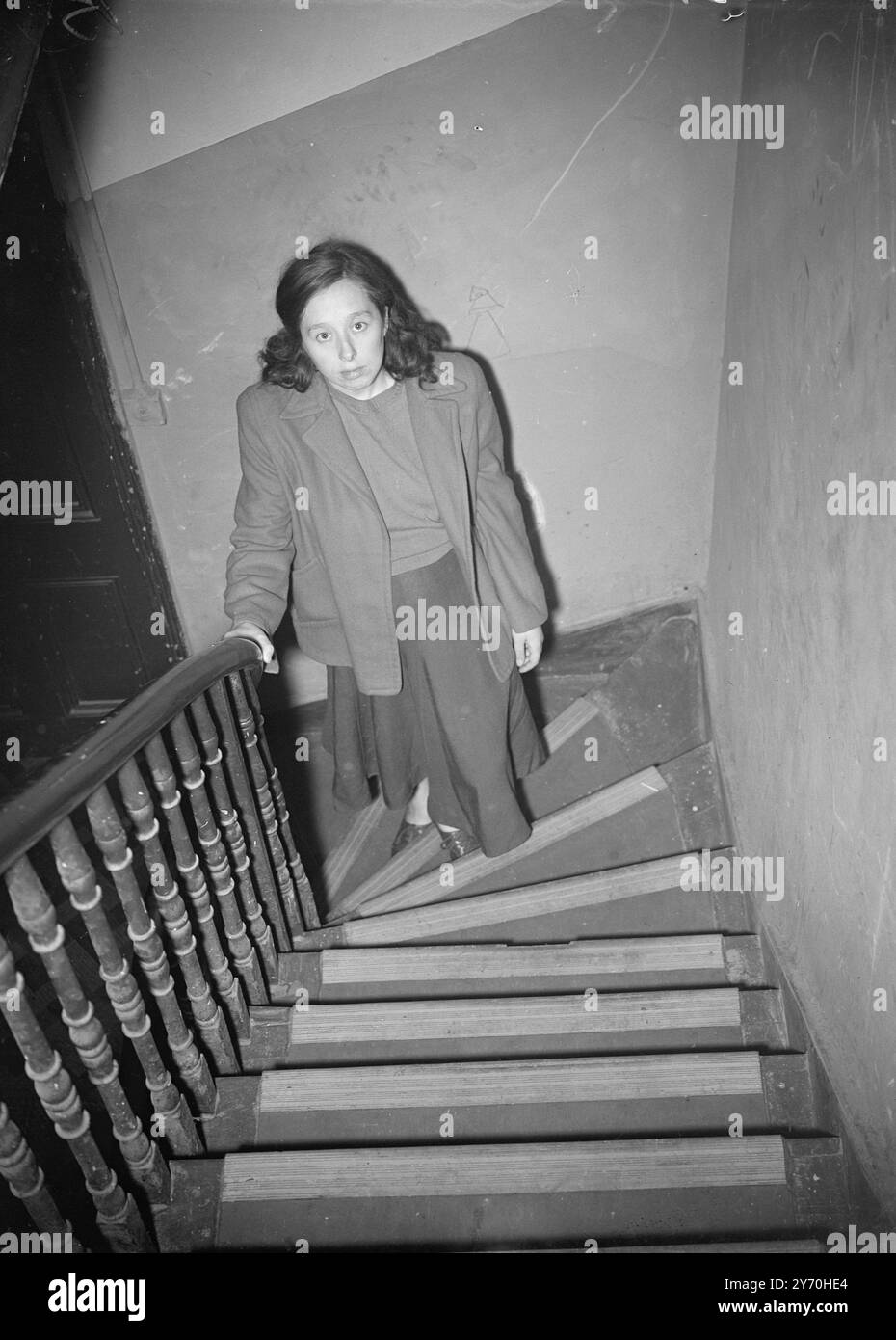 Woman and stairs and from behind Black and White Stock Photos & Images ...