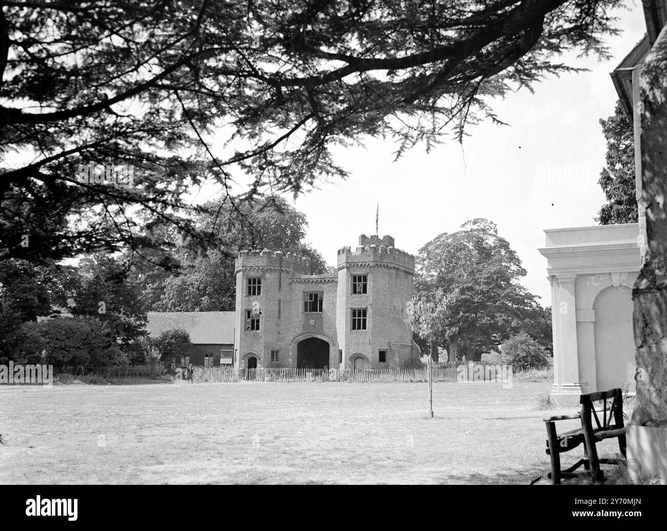 CHANGELESS ENGLAND Framed by the foliage of one of England's most ...