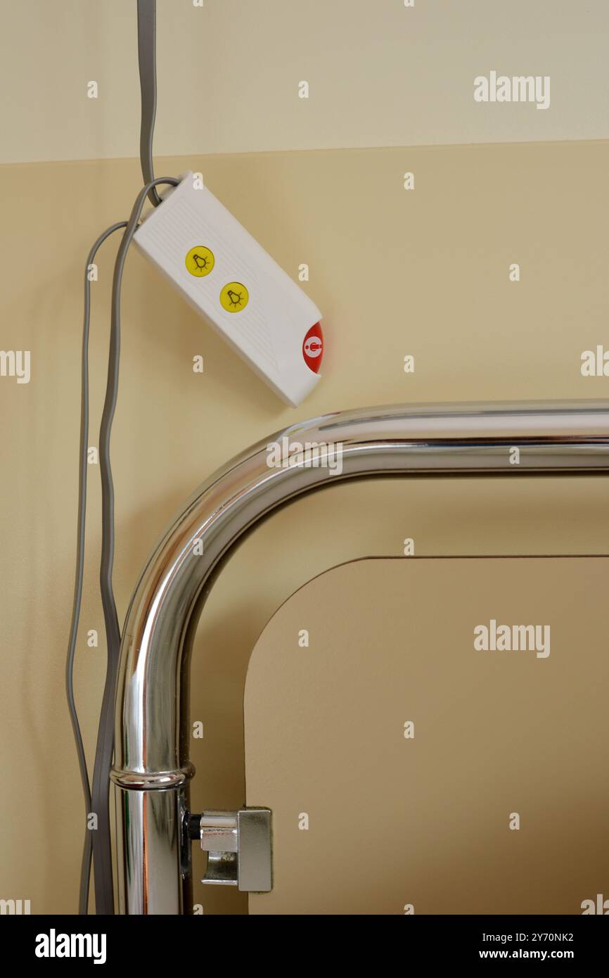 Part of a hospital bed with control emergency call and light change ...