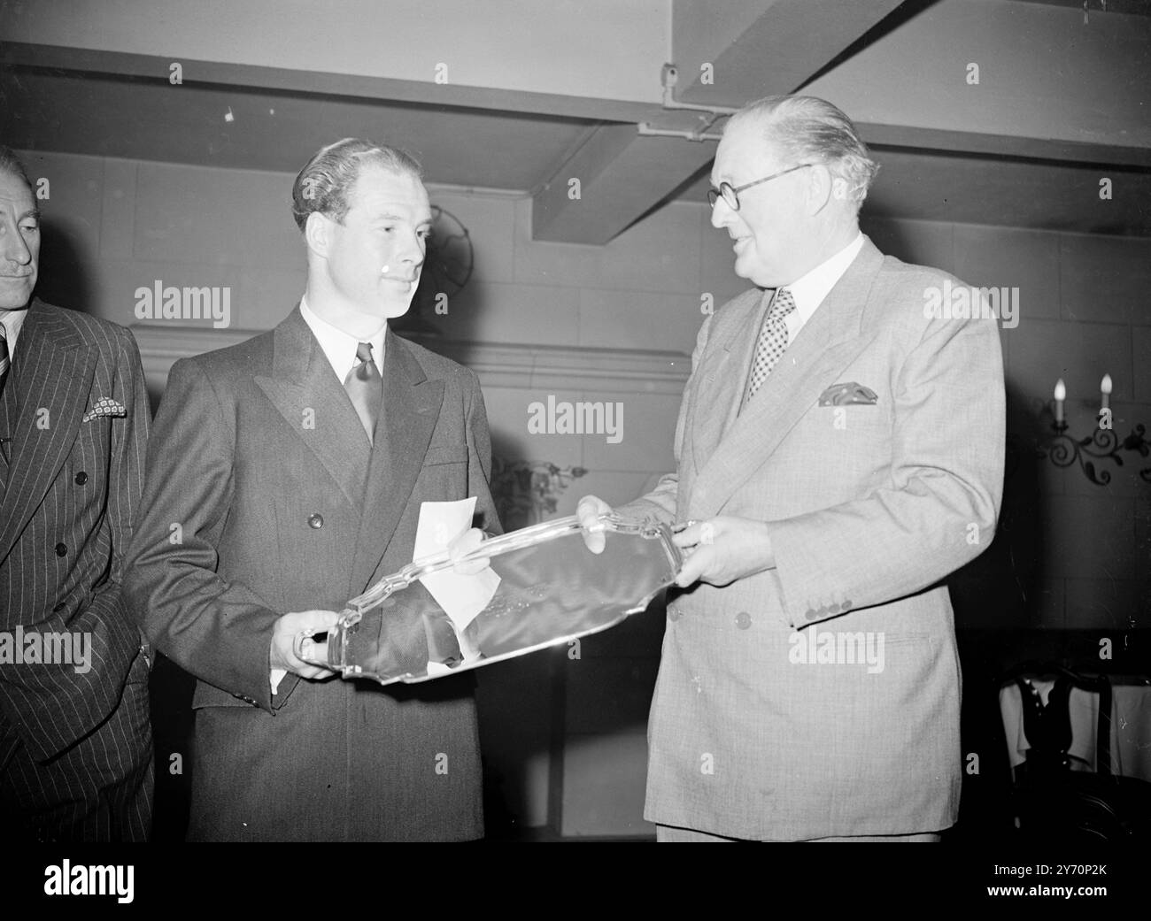 SILVER SALVER FOR THE WORLD'S FASTEST CYCLIST At a reception at the ...