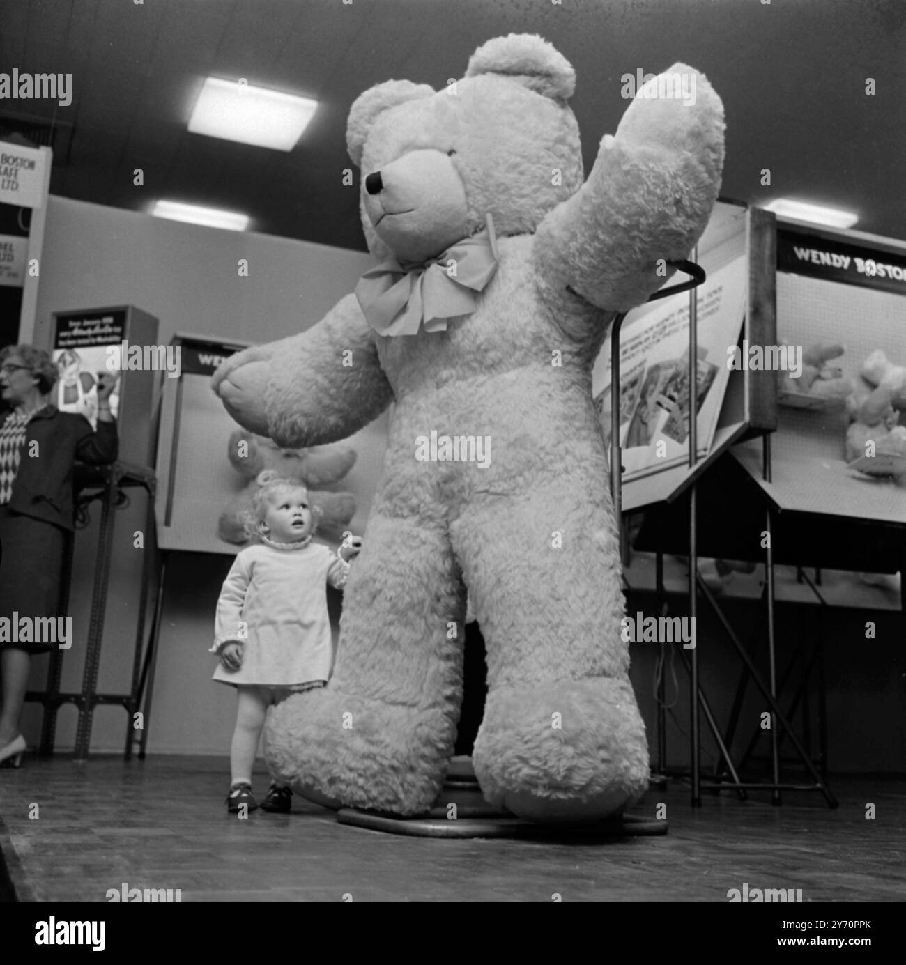 GIANT TEDDY BRIGHTON ; Two year old Heather Sayers stares in awe at a ...