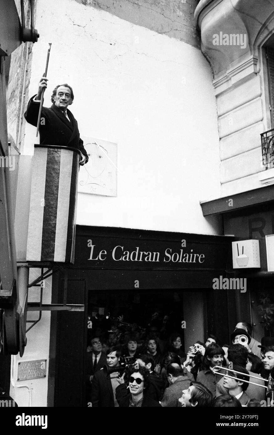 Salvador Dali unveils a Daliesque sundial on the wall of the Sundial ...