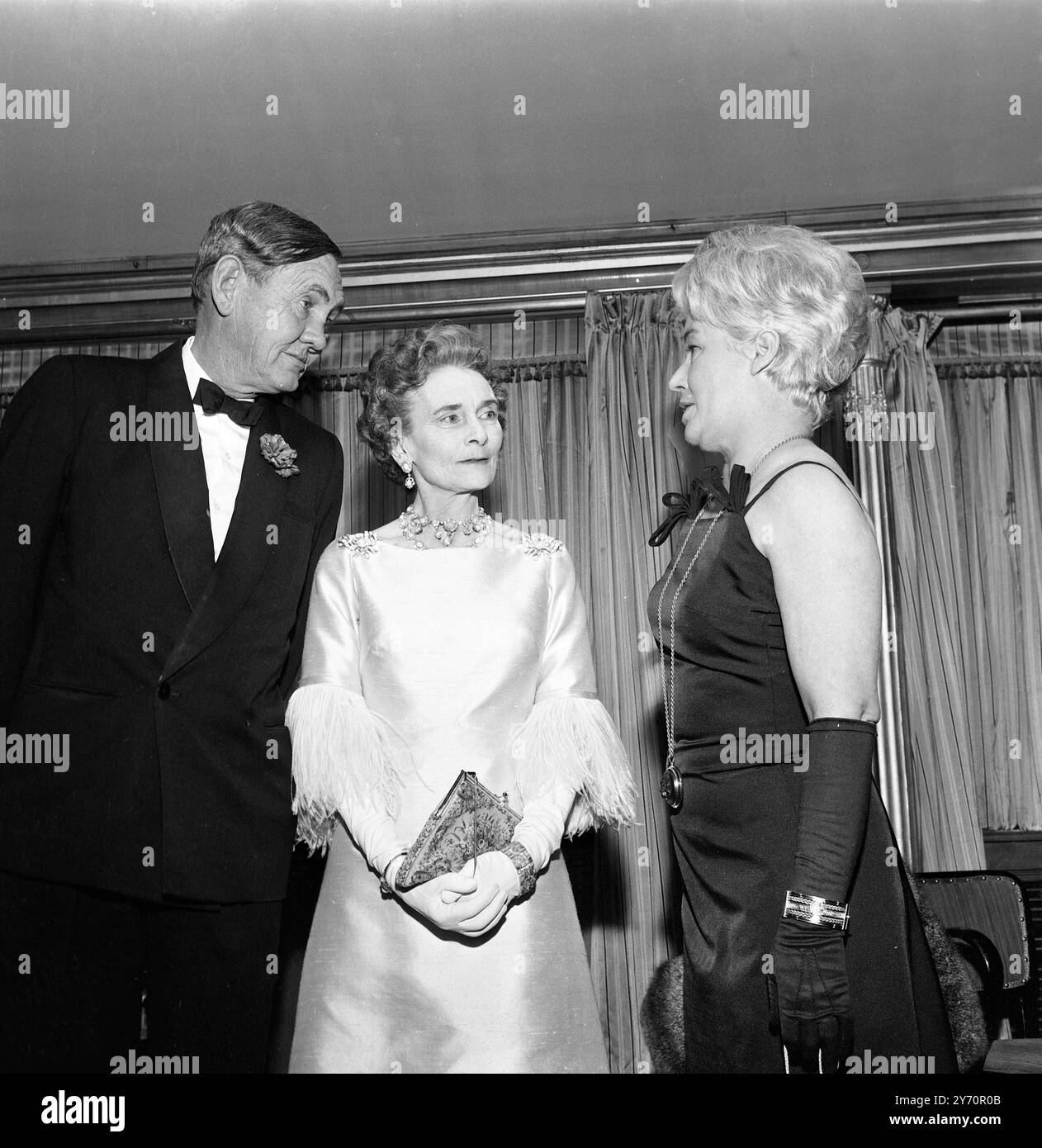 Mr John Gorton ( right ) , Prime Minister of Australia , looks across ...