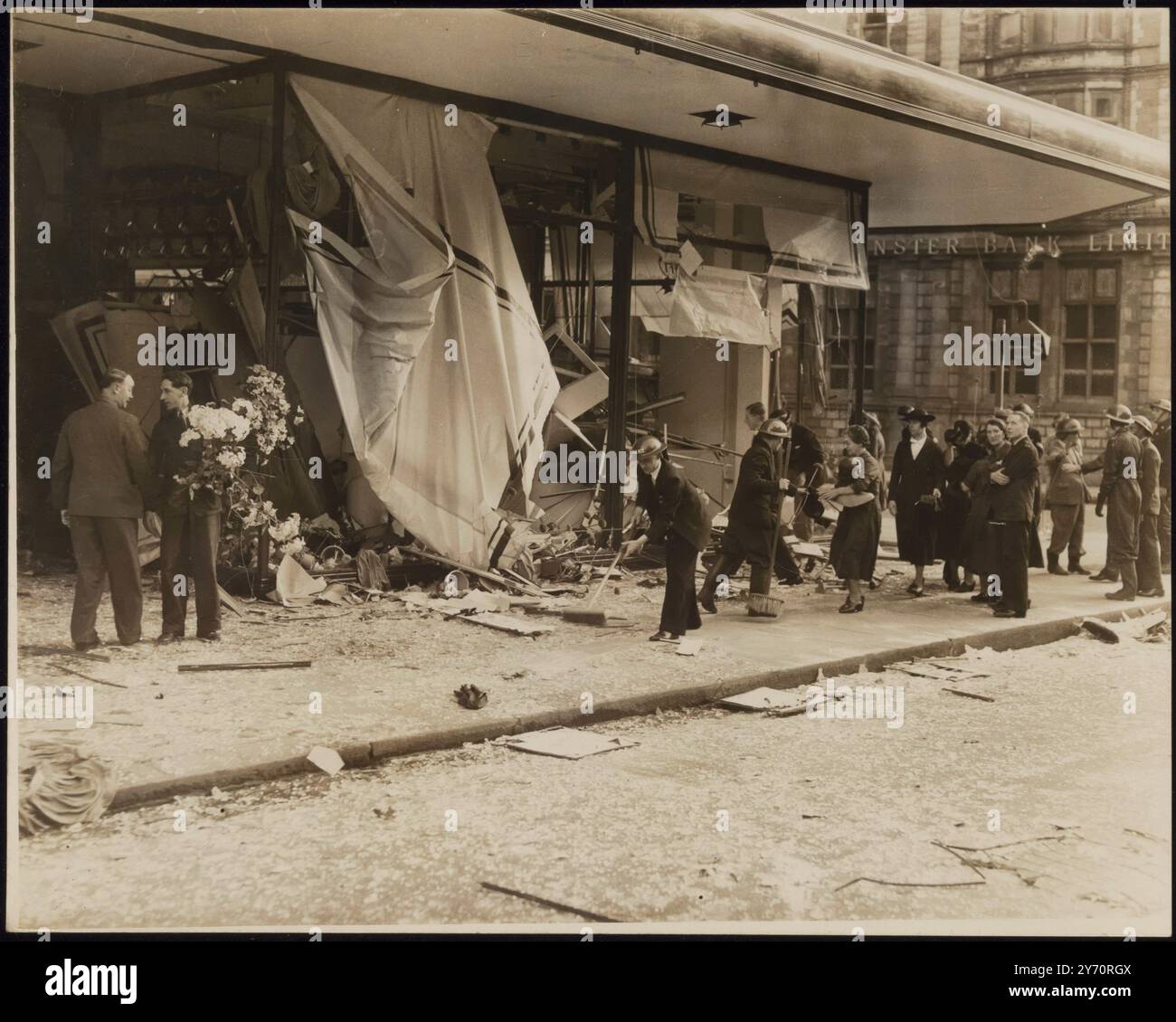 BOMBS ON THS WEST END.Department stores and shops were damaged when ...