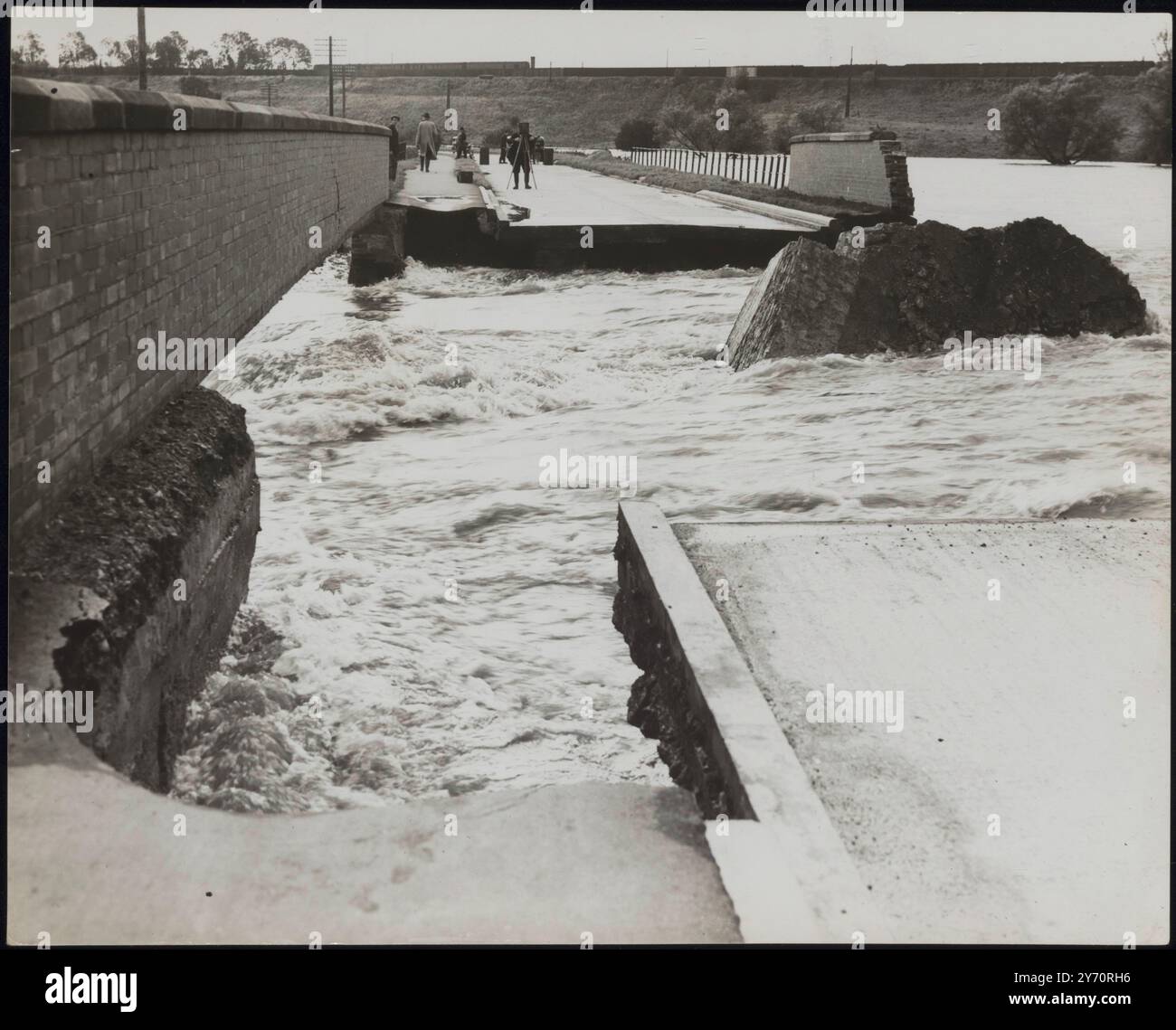 BRIDGE SWEPT AWAY BY GREAT FLOODS FOLLOWING CLOUDBURST.Lakes miles wide ...