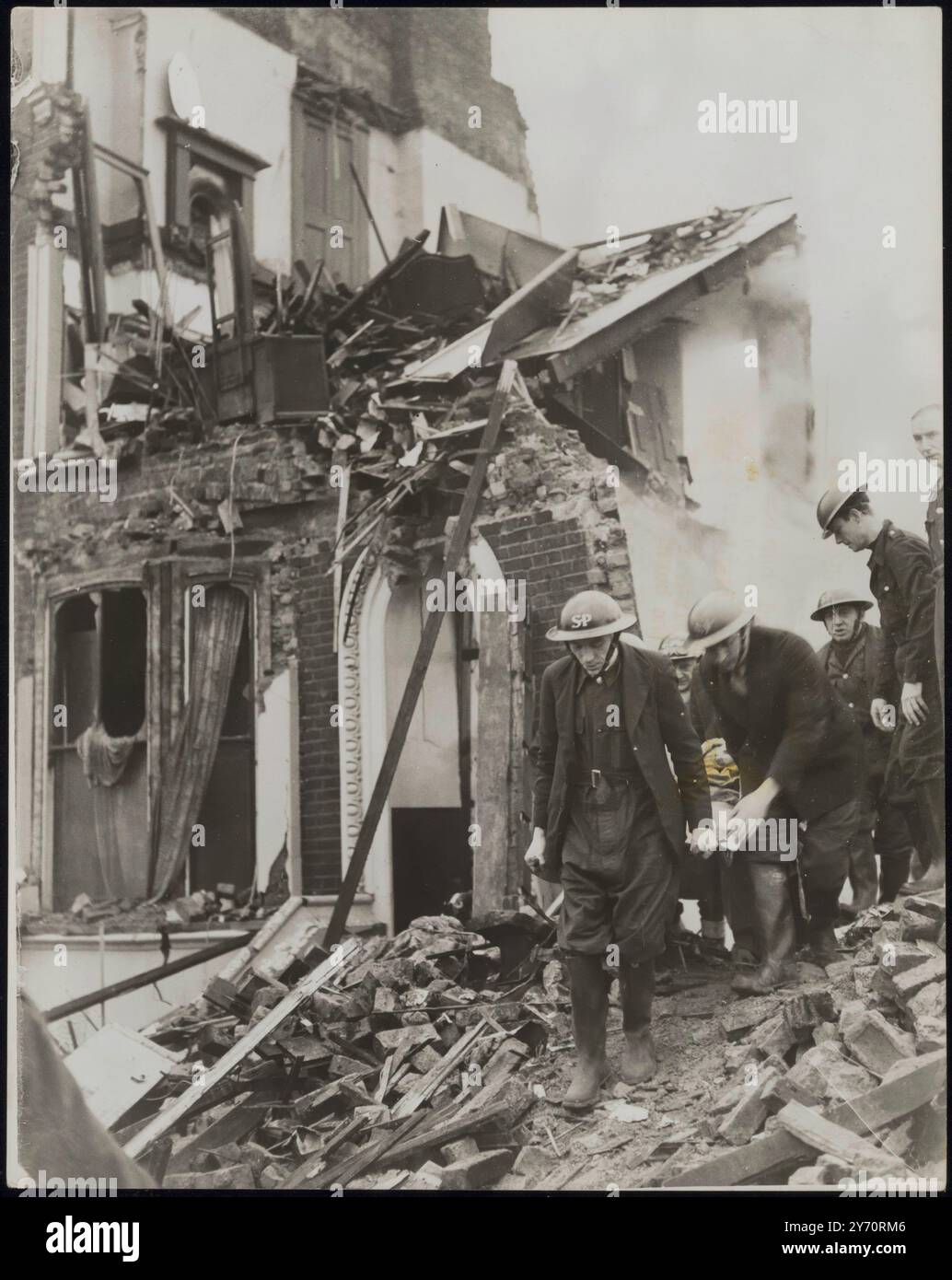 HOUSES DAMAGED DURING NIGHT RAID ON LONDON AREA.Houses were damaged ...
