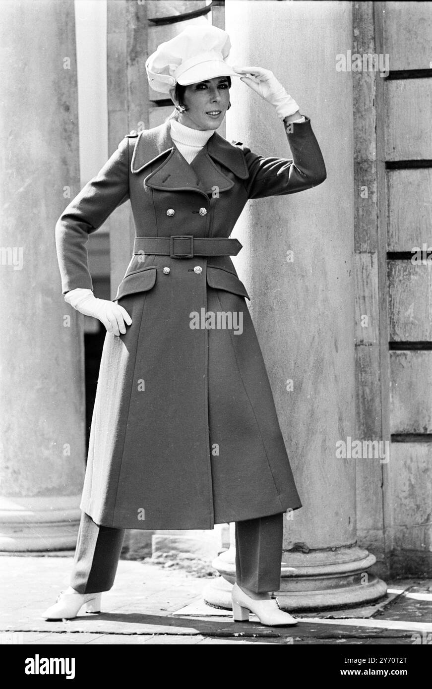 Harvey Gould designed this smart air force blue ' maxi ' trench coat ...