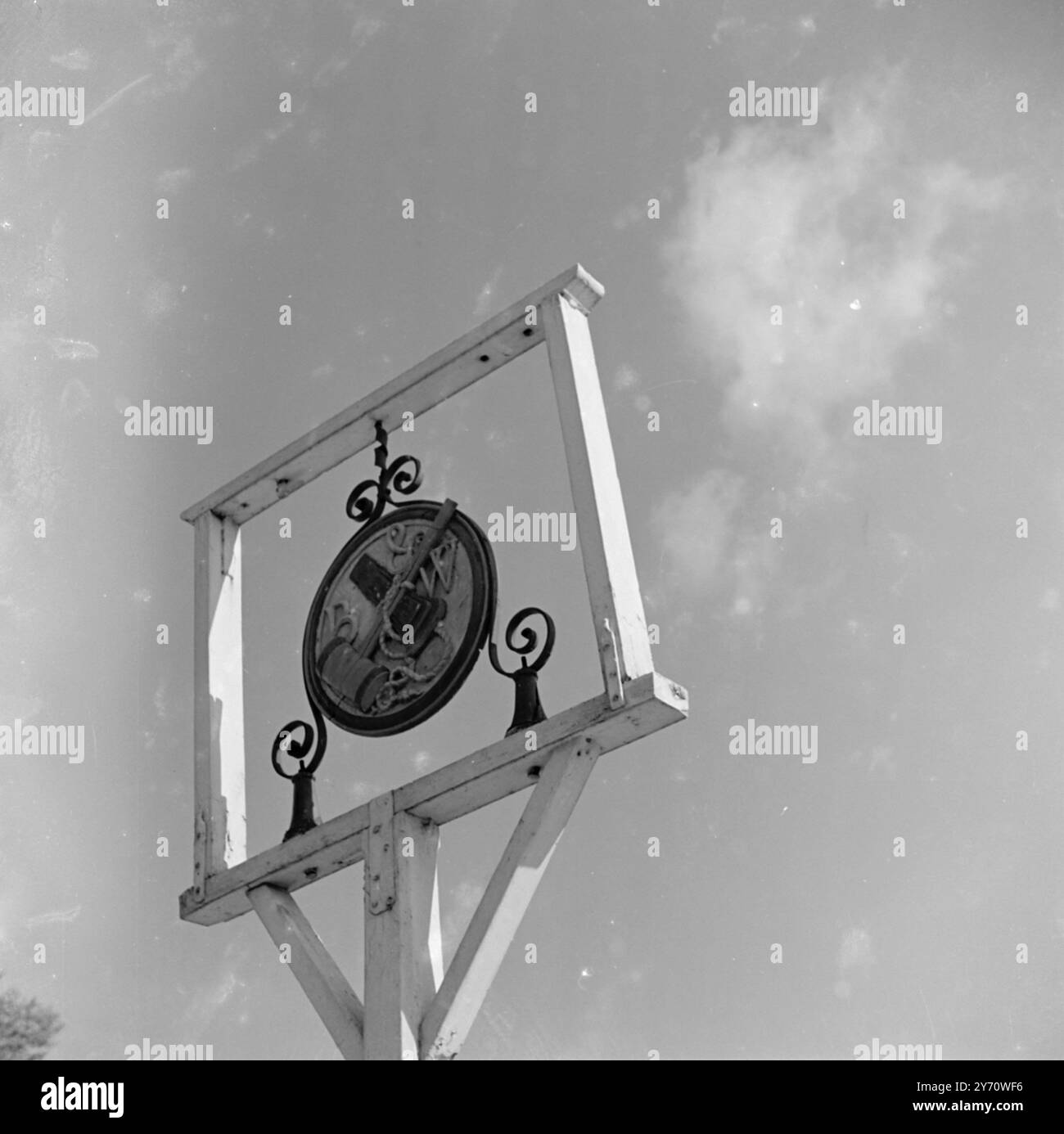 Beetle and Wedge inn sign 1945 Stock Photo - Alamy