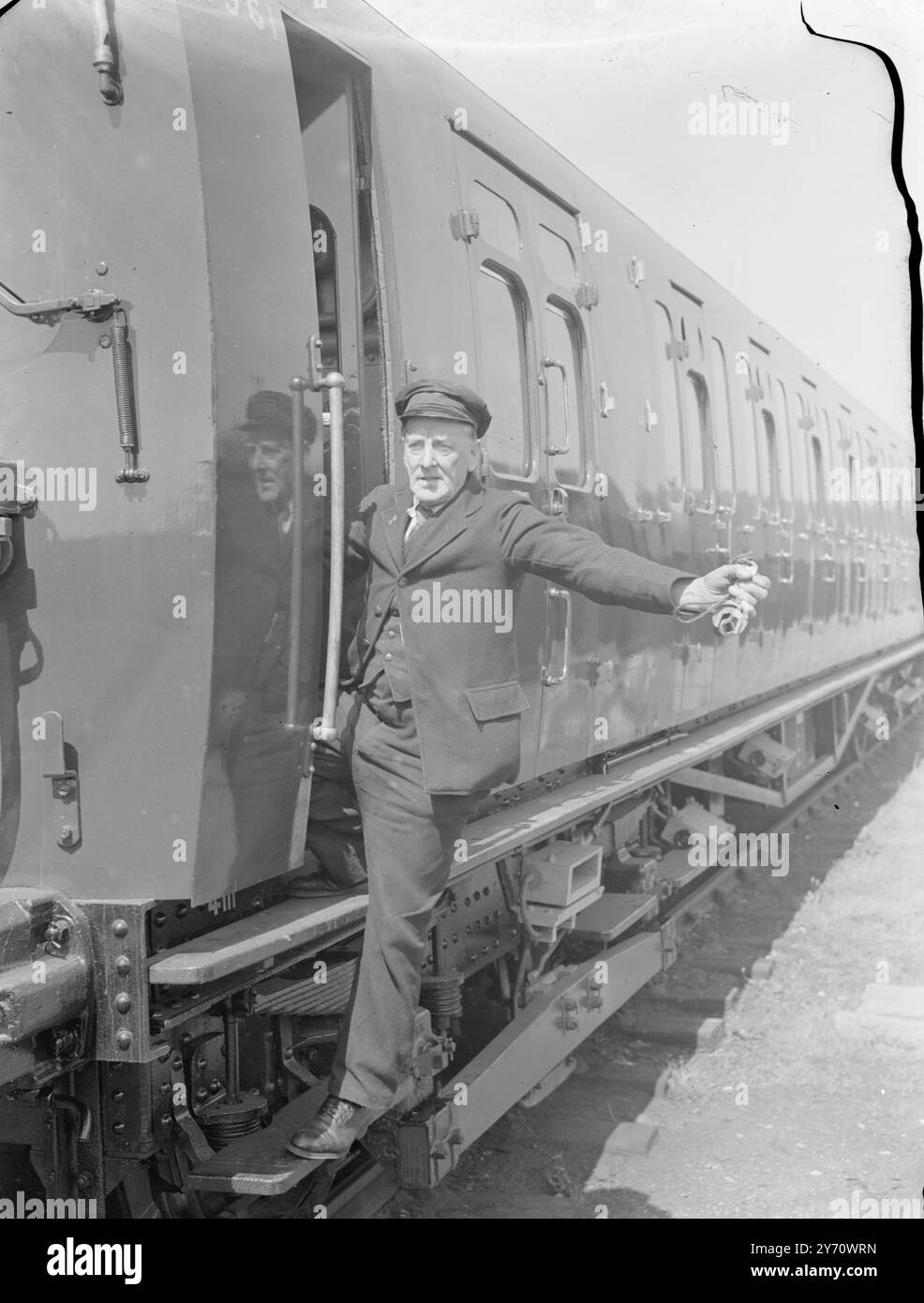 Electric Train and News Coaches 1953 Stock Photo - Alamy