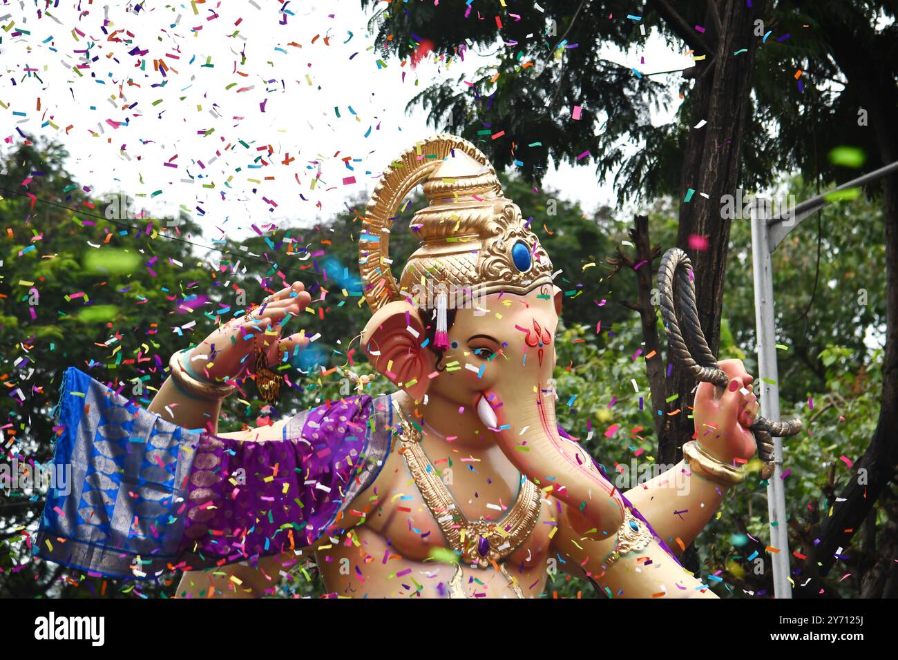 Ganesha Chaturthi festival in Mumbai, India Devotees welcome an idol of ...