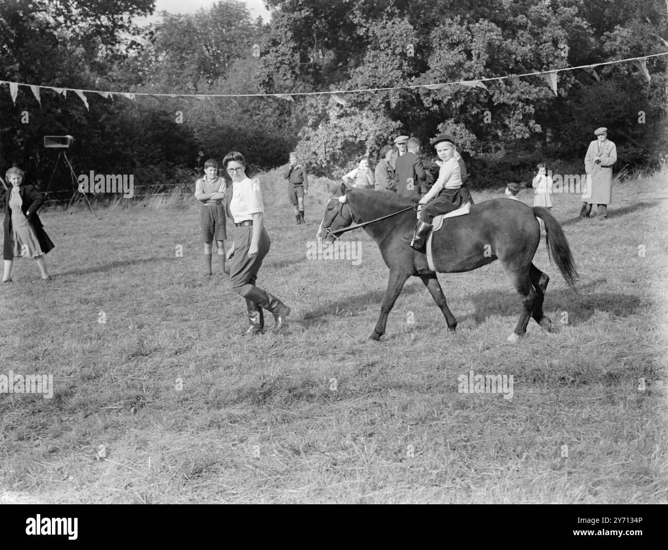 Master Dennis and pony . 1 January 1946 Stock Photo - Alamy