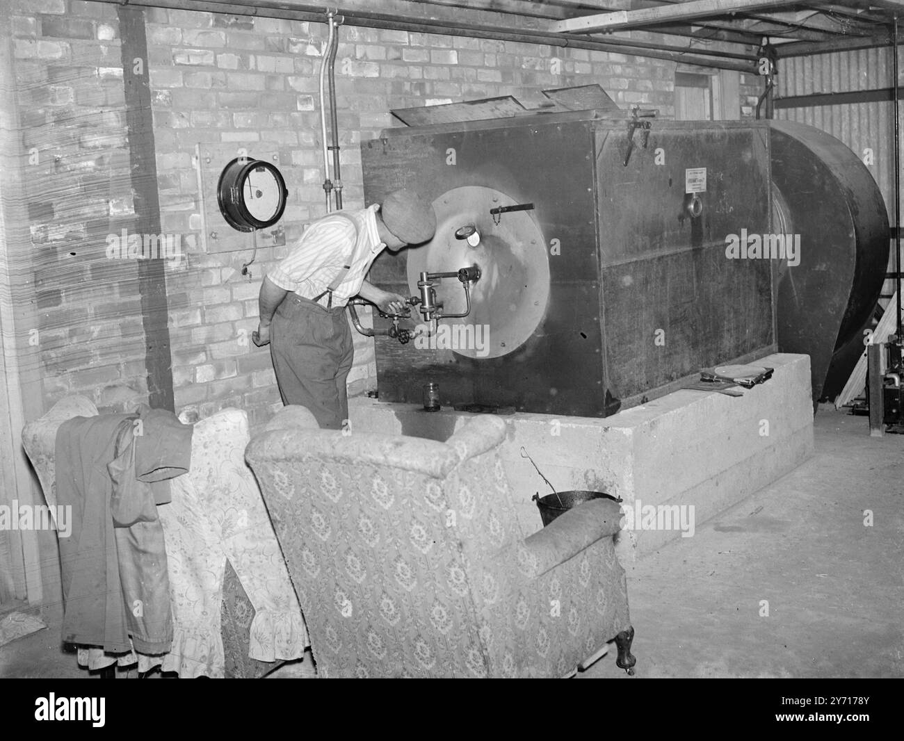 Oil furnace 40s Black and White Stock Photos & Images - Alamy