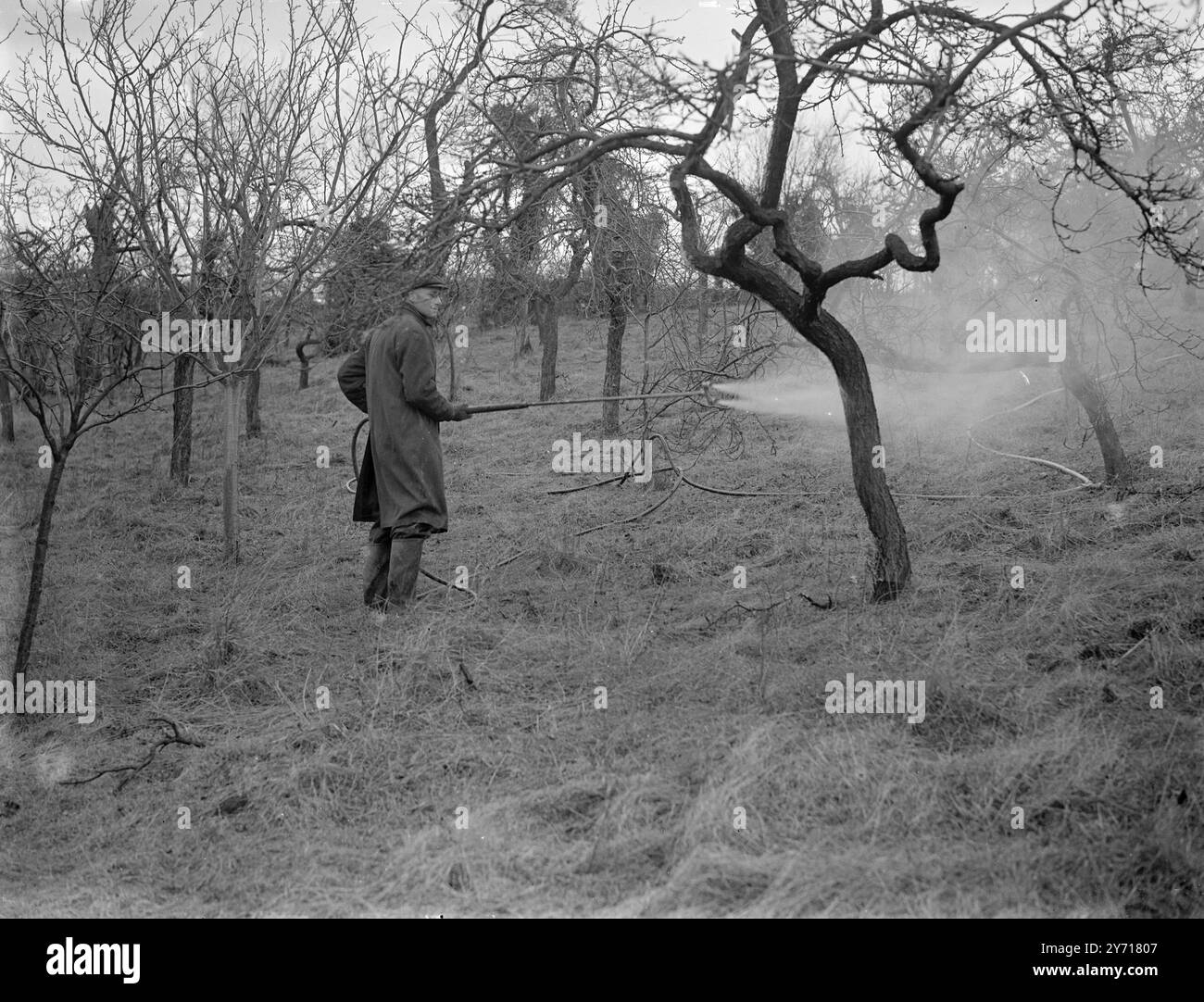 Spraying pesticides field Black and White Stock Photos & Images - Alamy