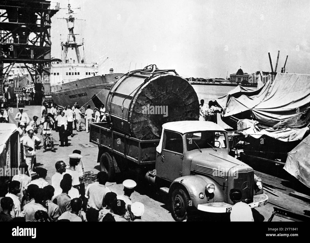 The round-the-moon Soviet spacecraft Zond V being lifted by crane from ...
