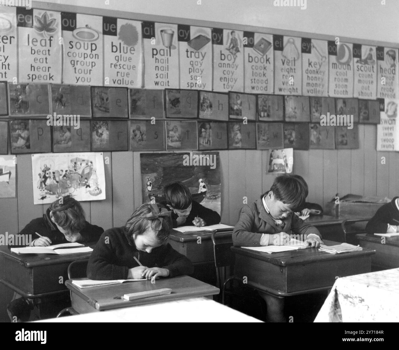 Children writing in their books during a school lesson , Fair Isle ...