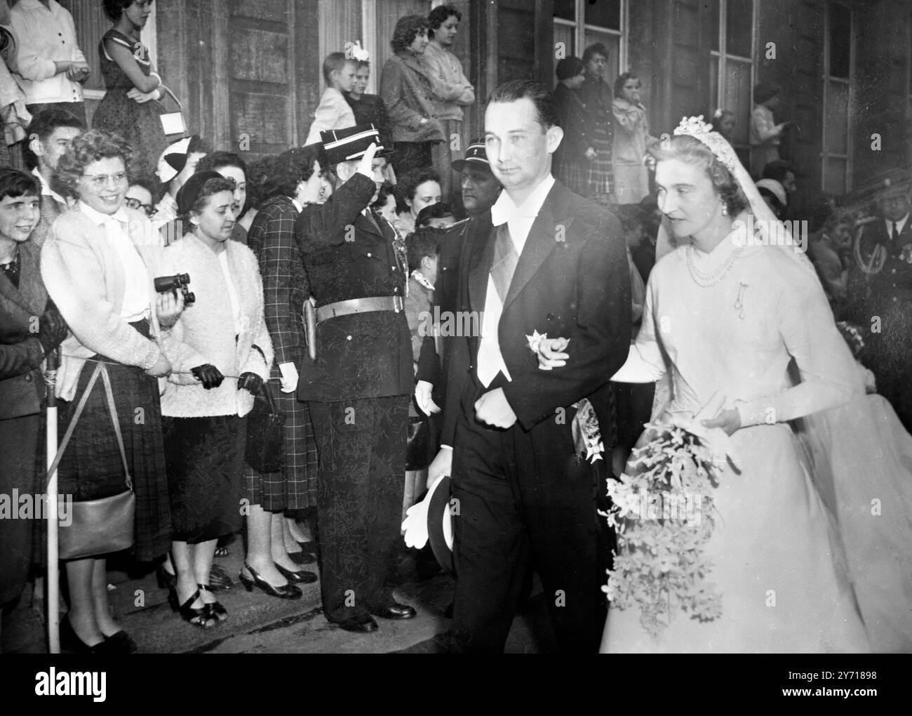 On the arm of bridegroom , Prince Frances-Ferdinand of Austria , blonde ...
