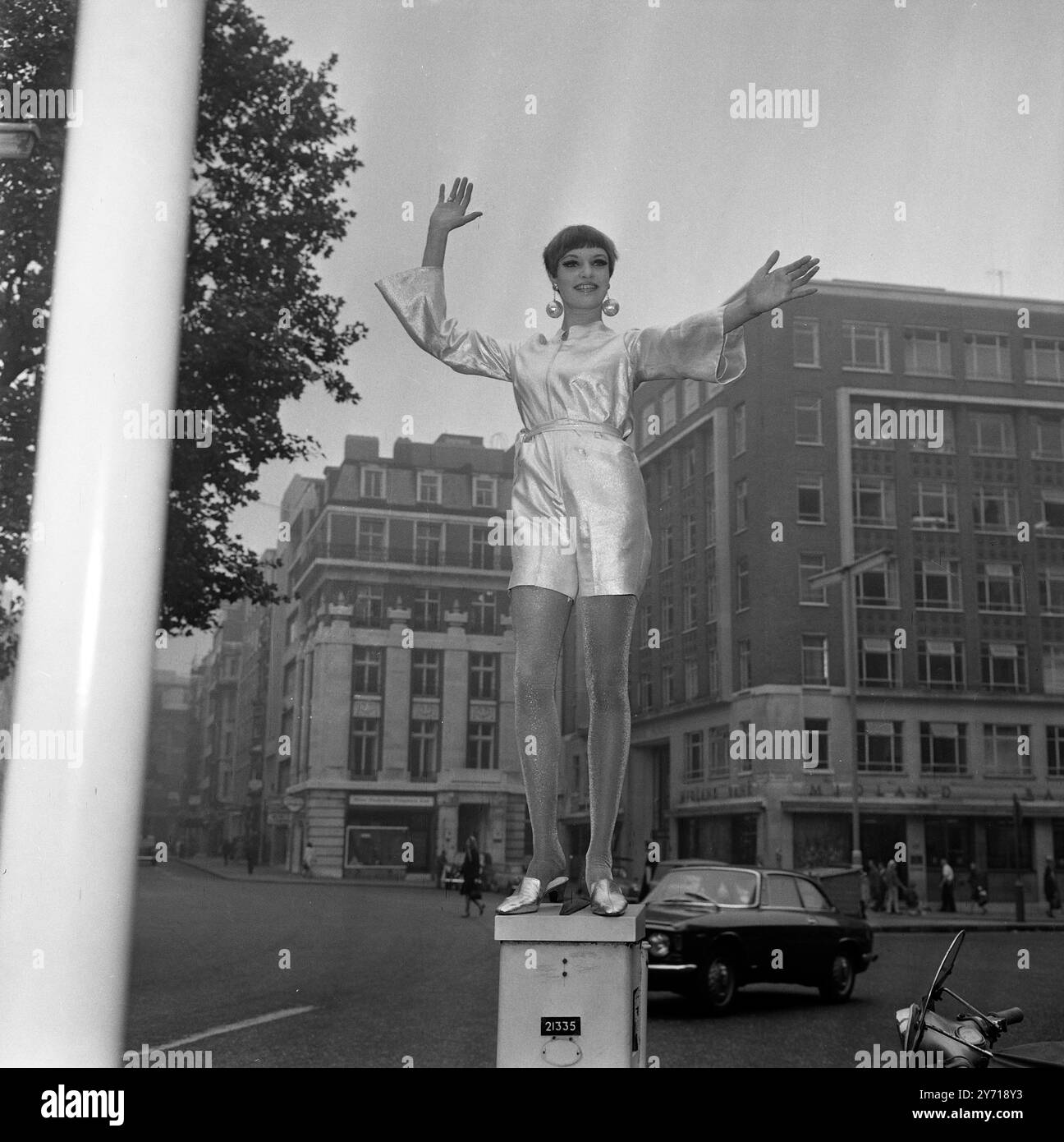 Model girl Connie Kay is posing in the middle of Mayfair in an ...