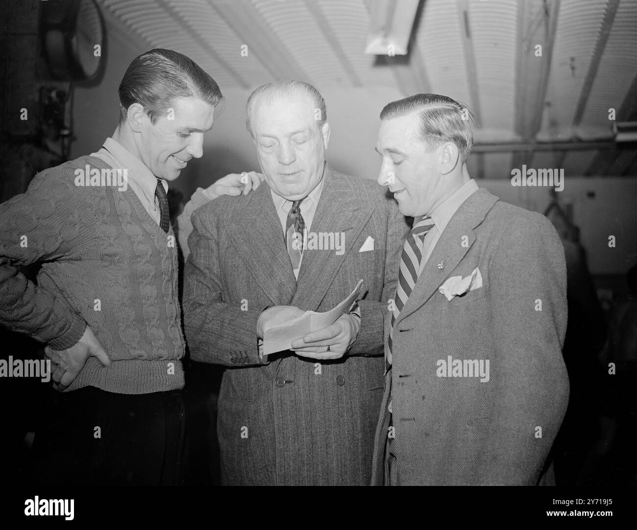BOXING IS THEIR BUINESS Having a chat at a London gymnasium are , JACK ...