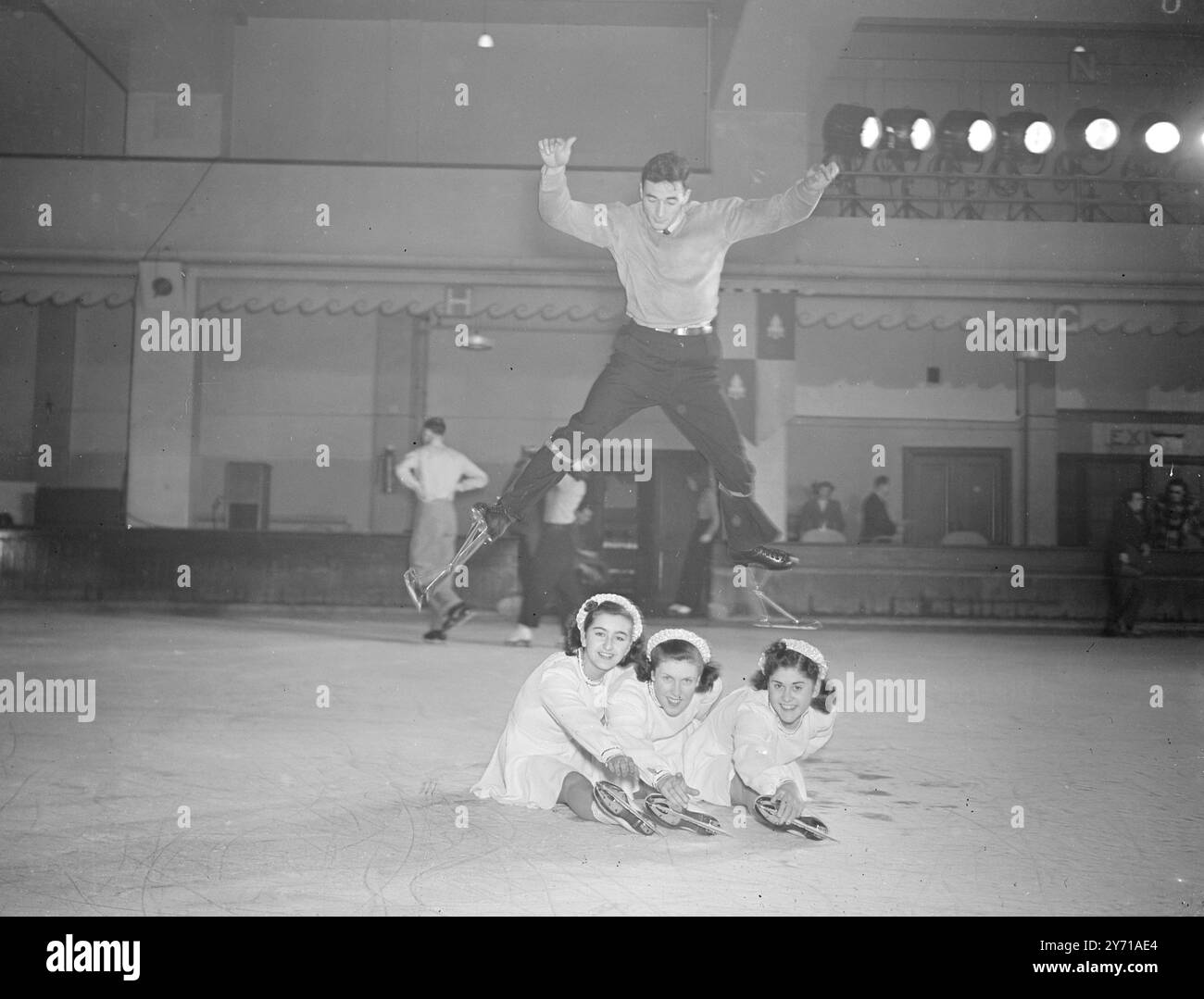 STILTED LEAP BERNARD SPENCER , exponent of skating on stilts , makes a ...