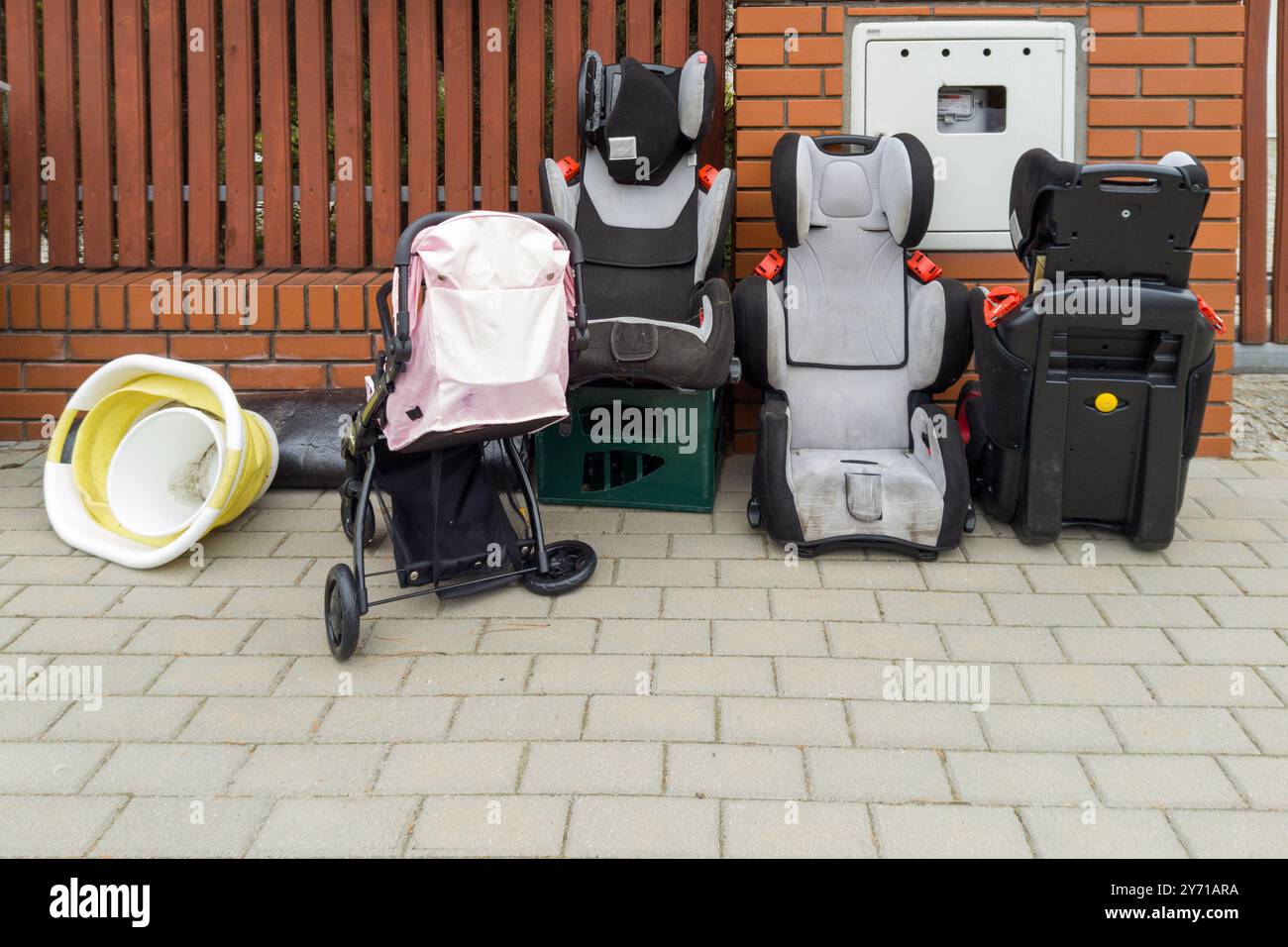Old Child Car Seats and Stroller Awaiting Collection Stock Photo - Alamy